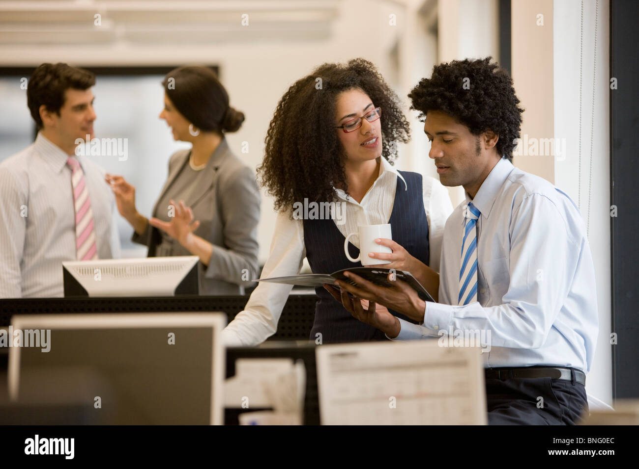 Business executives discussing in an office Stock Photo - Alamy