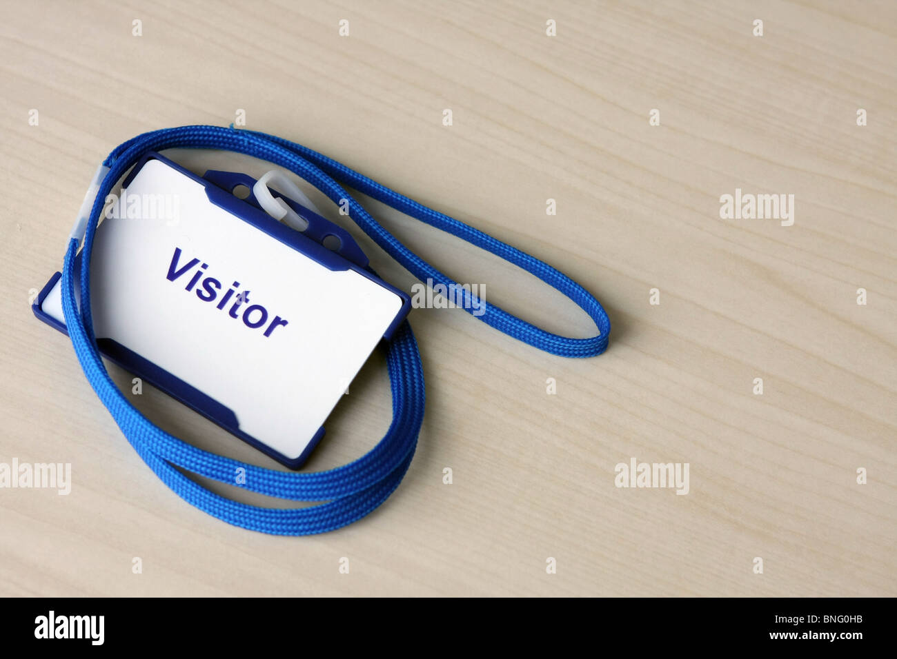 a visitors badge in a holder Stock Photo - Alamy