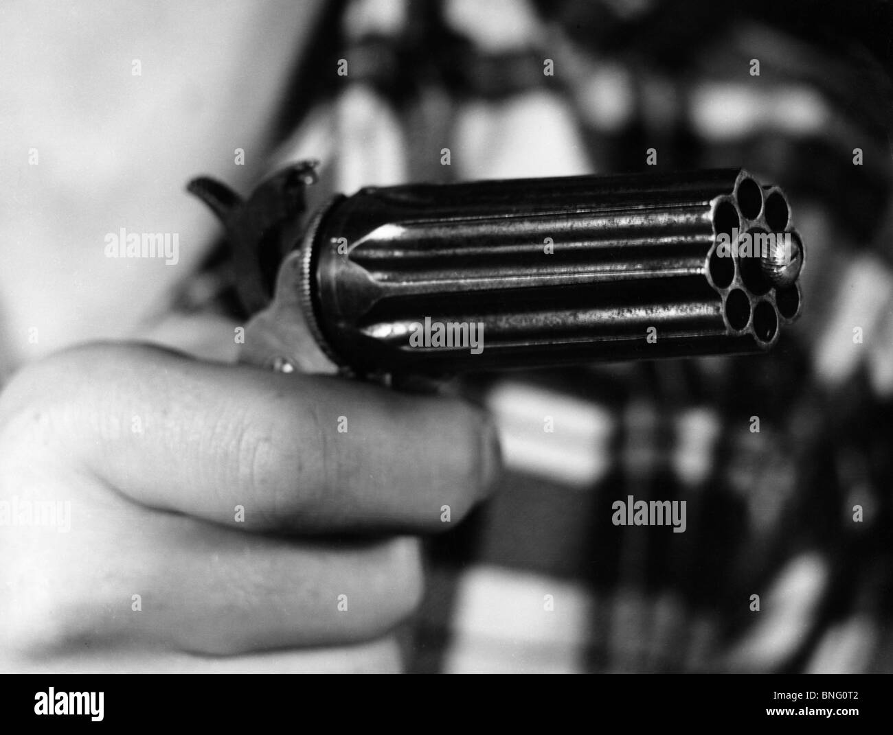Close-up of a person's hand holding a handgun, 22 Caliber Rupertus ...
