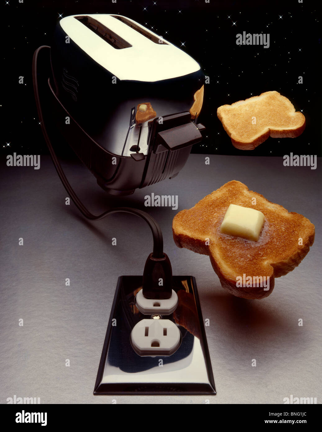Toasts and toaster floating against starfield background Stock Photo ...