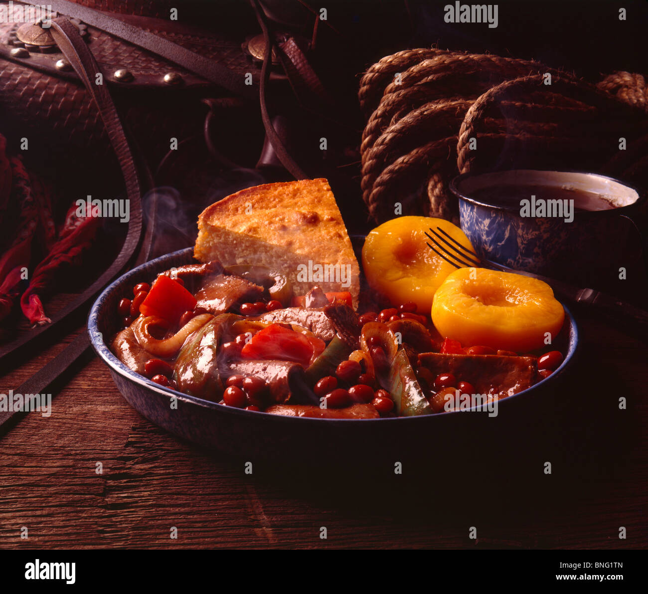 Western corn bread and beef stew with beans Stock Photo - Alamy