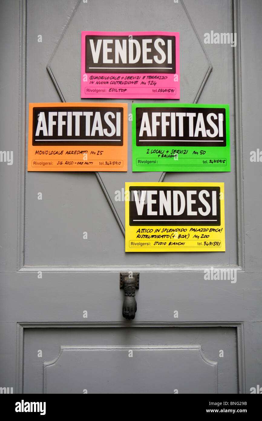 door with for sale signs Stock Photo - Alamy