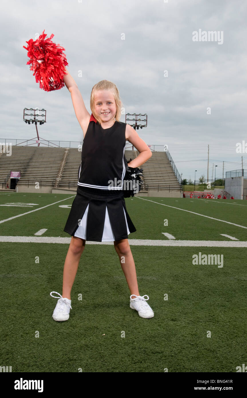 Cheerleader girl in a football stadium Stock Photo - Alamy