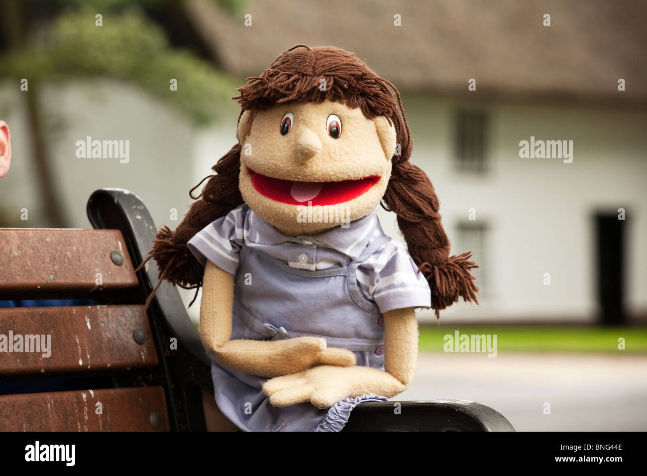 Brunette smiling girl Puppet Stock Photo - Alamy
