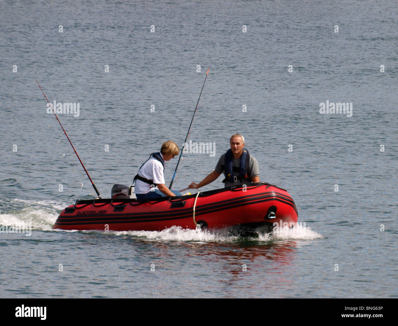 Inflatable dinghy outboard motor hi-res stock photography and images ...