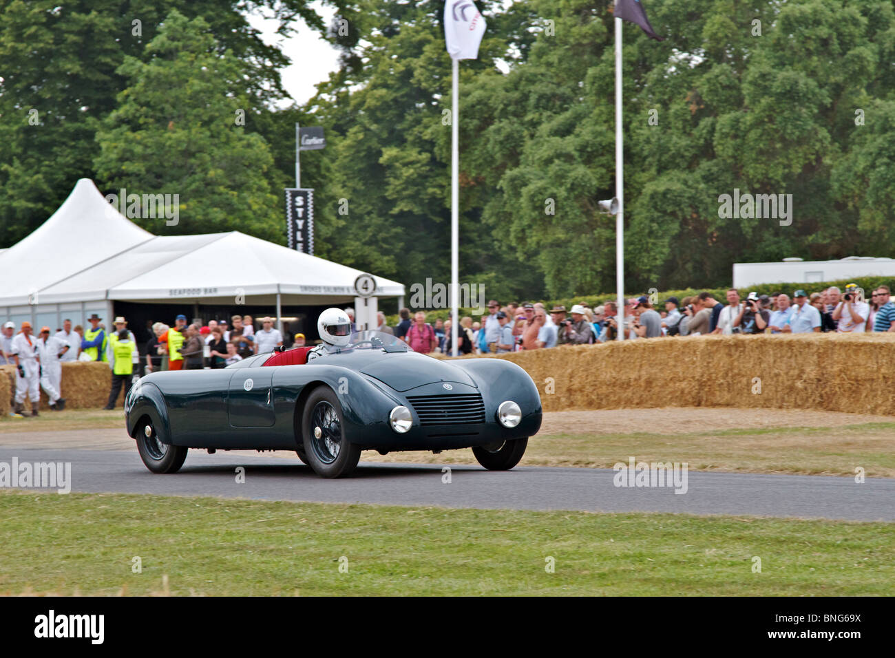 classic car racing uphill during Goodwood Festival of Speed 2010 Stock ...