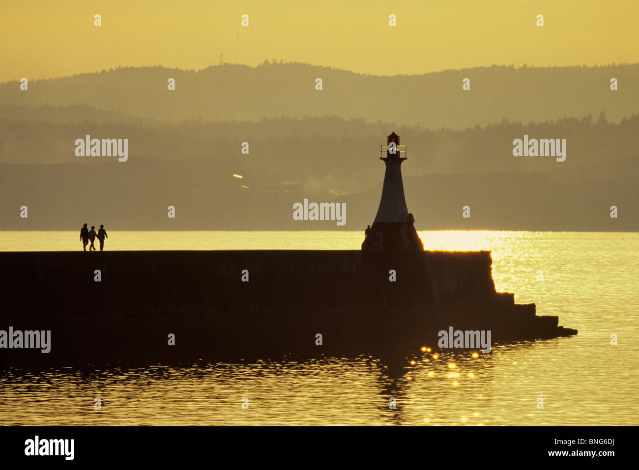 Lighthouse on a jetty, Ogden Point, Victoria, Vancouver Island, British ...