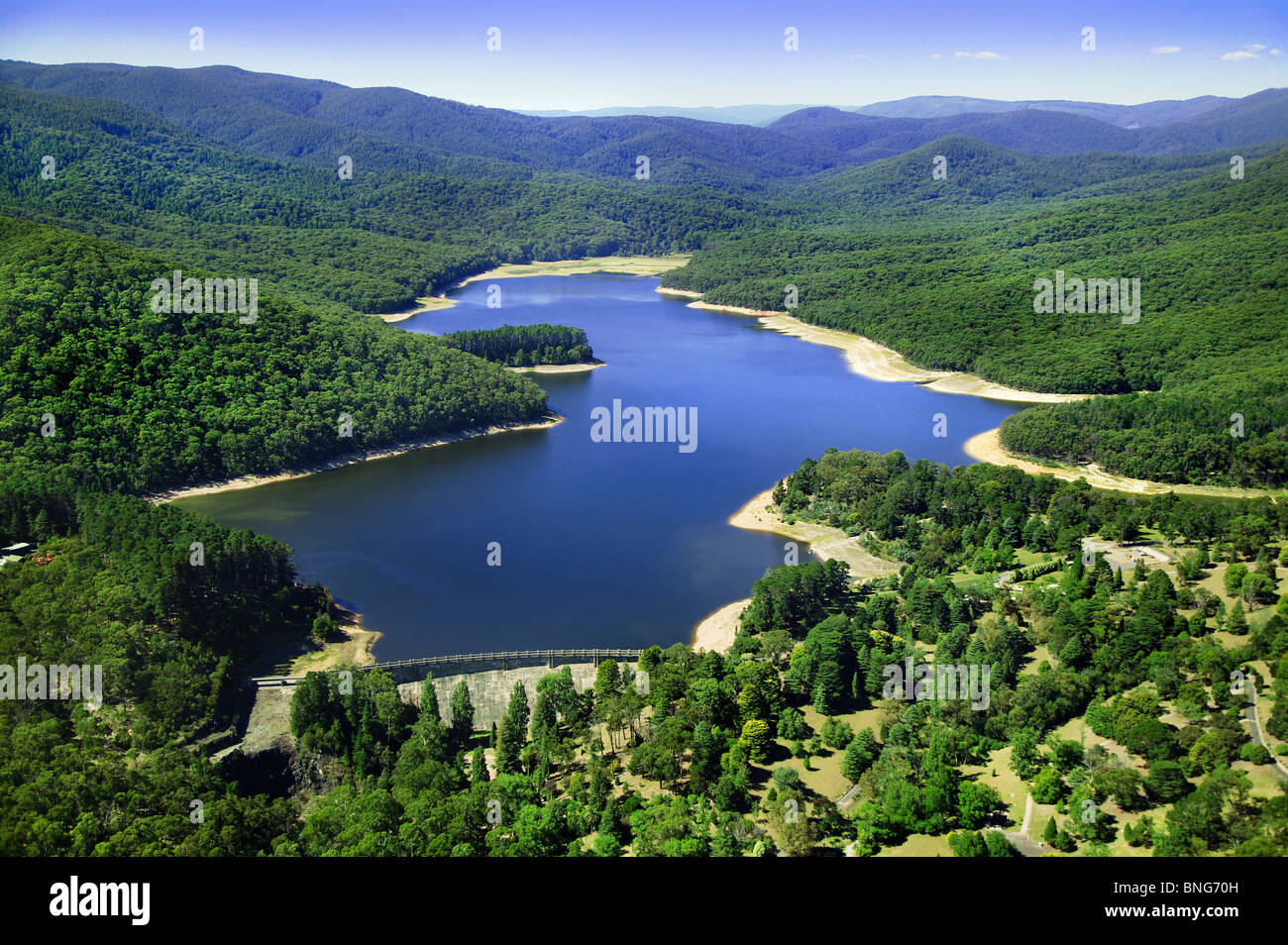Aerial photo of dam in between mountains Stock Photo - Alamy