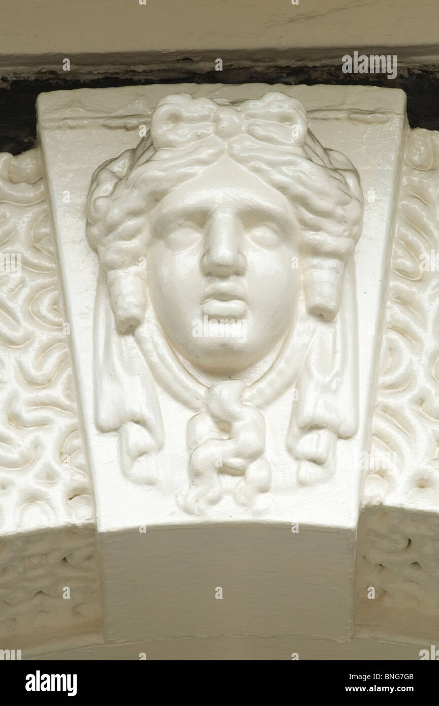Georgian relief sculpture above doorway arch. Bedford Square Bloomsbury ...