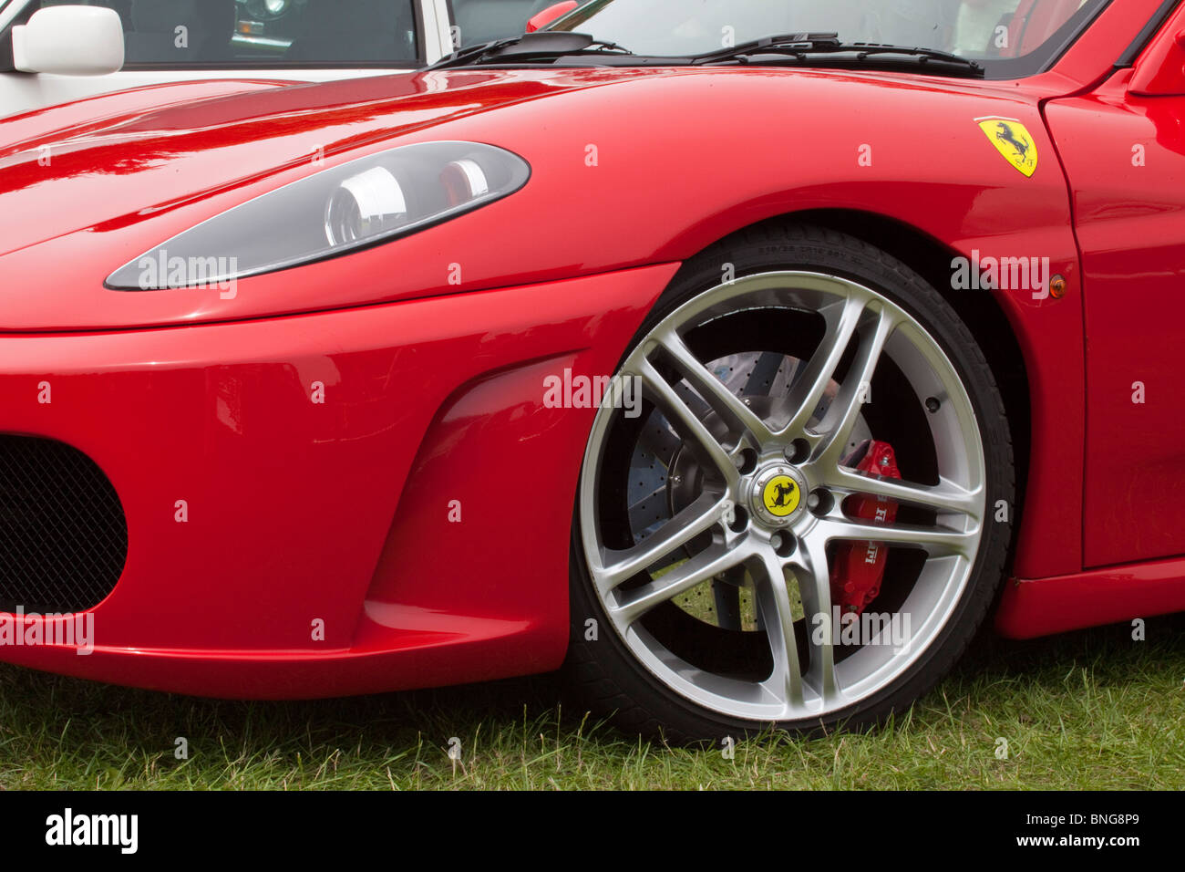 Red Ferrari vintage car F430 GTS Wheel and badge, at car show. View ...
