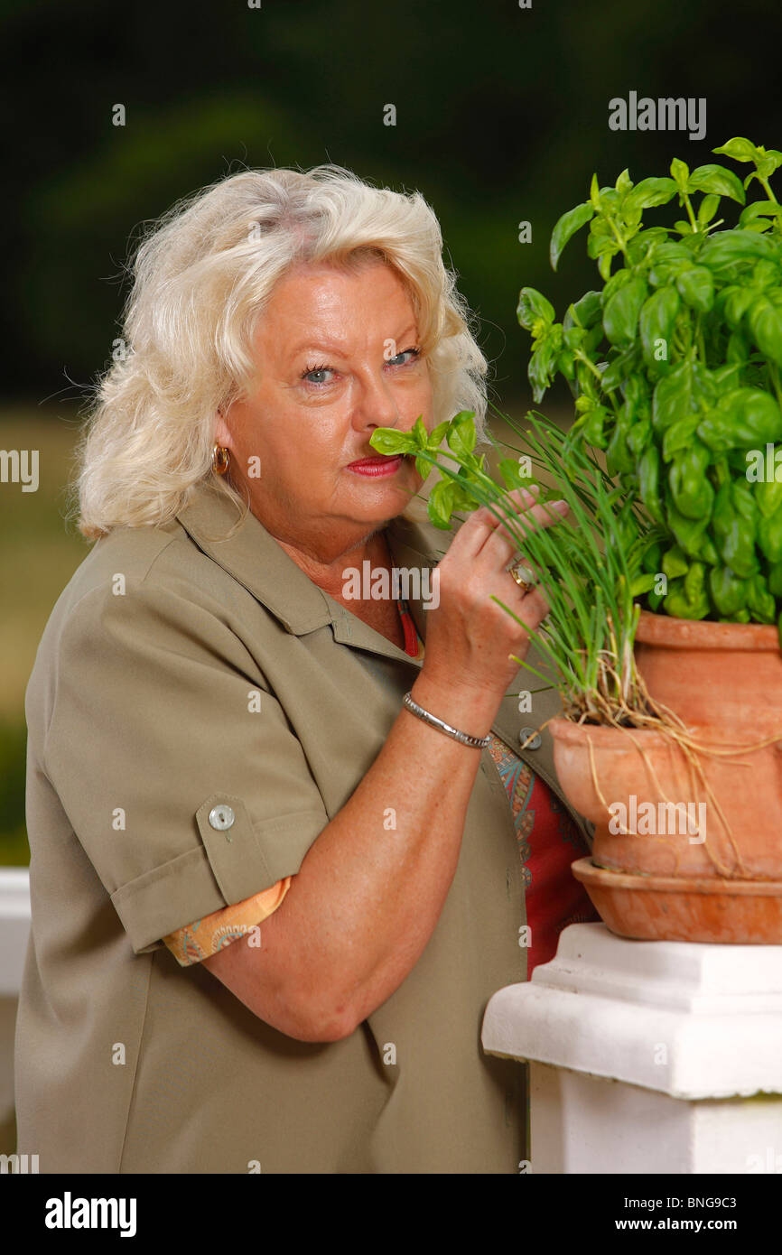 Woman Smelling Basil High Resolution Stock Photography and Images - Alamy