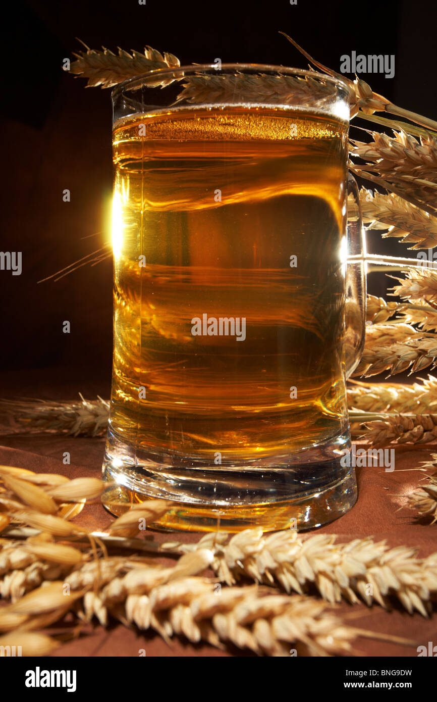 Glass of beer with grain Stock Photo - Alamy