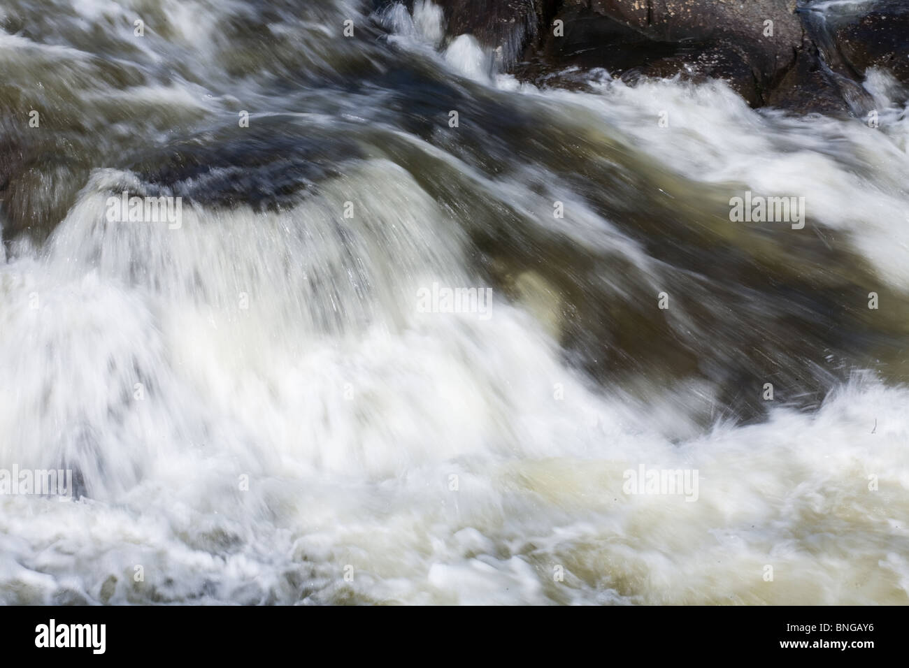 Raging water stream of the mountain river, horizontally Stock Photo - Alamy