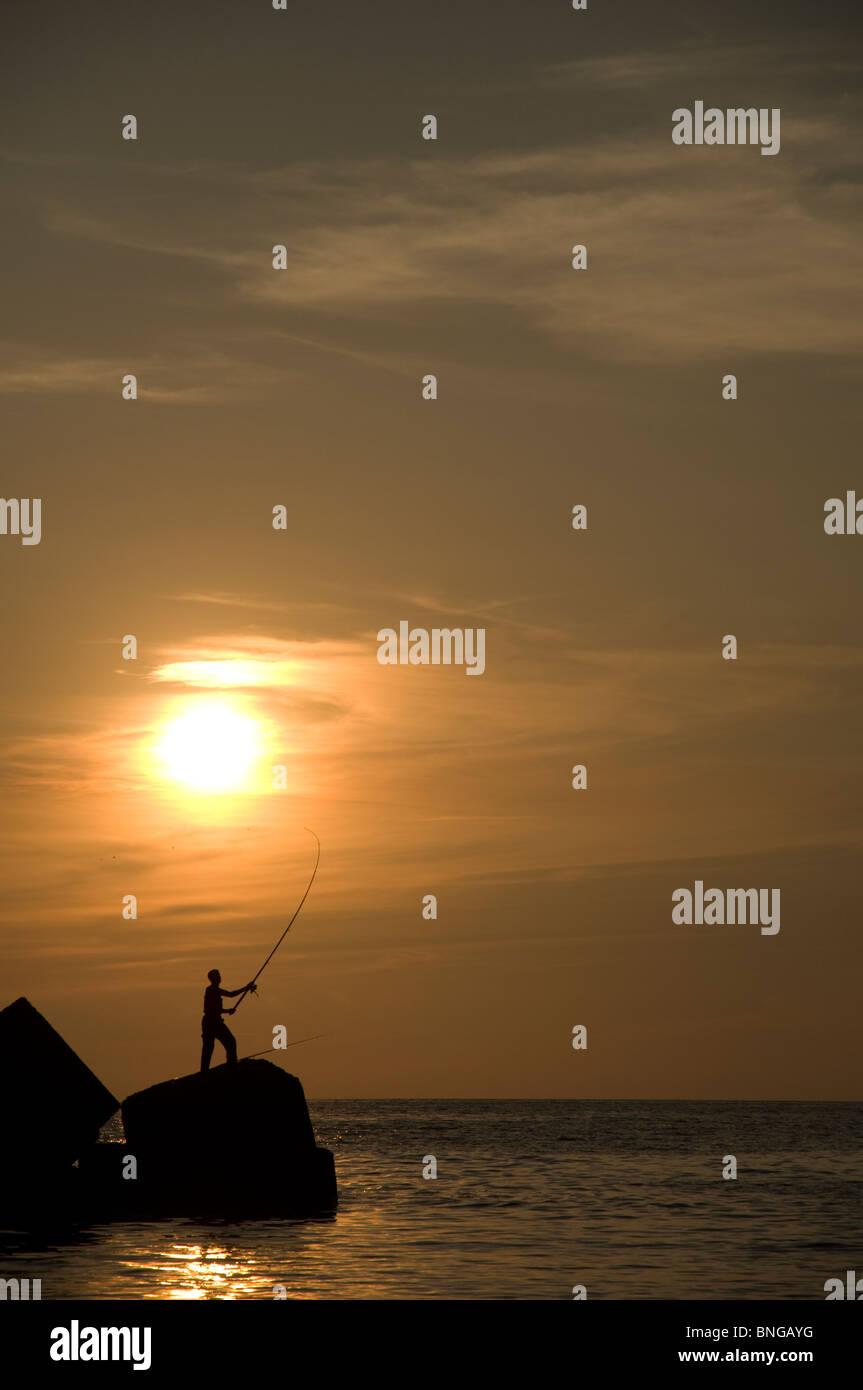 A man fishing in the Baltic See Stock Photo - Alamy