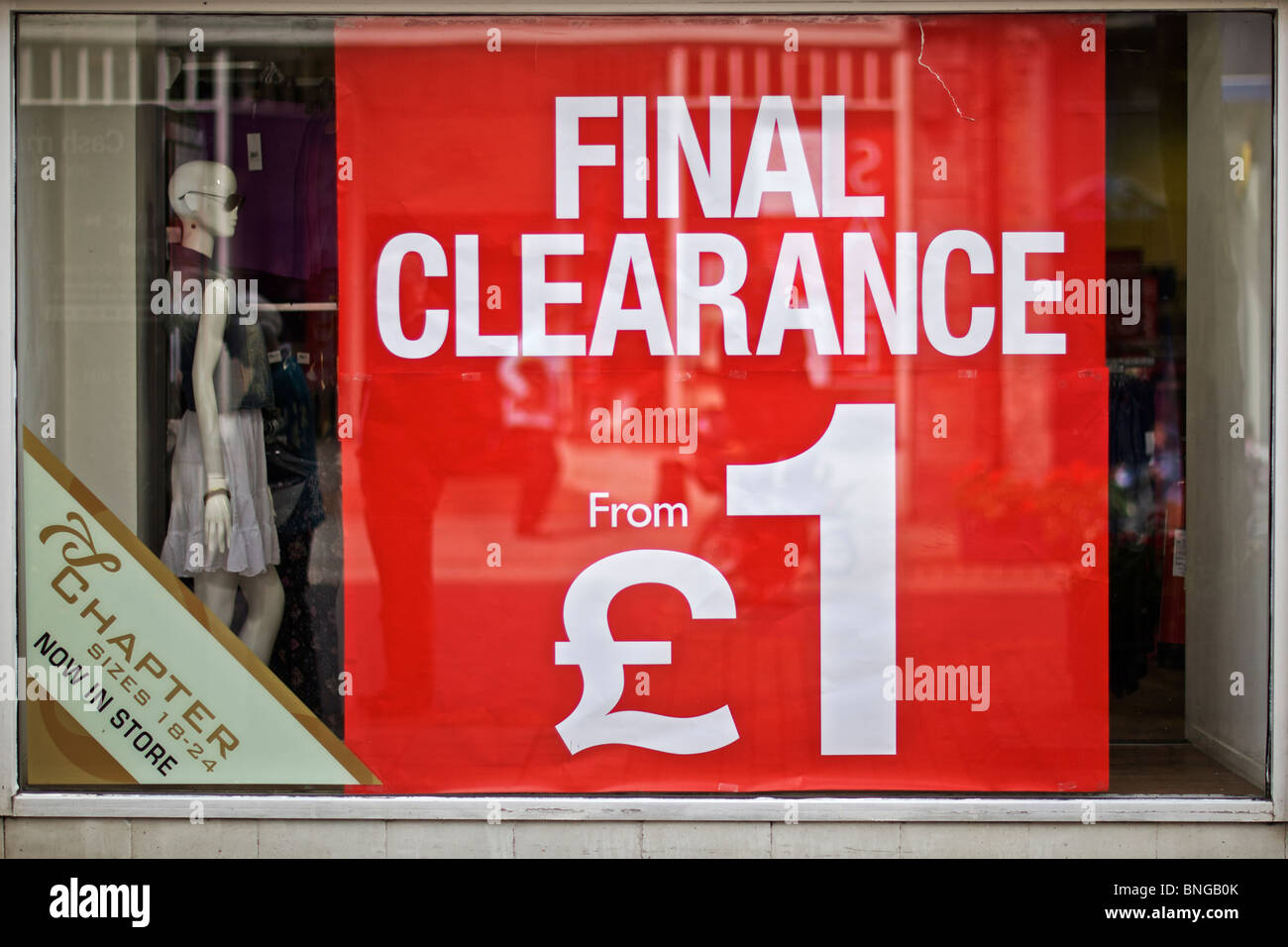 Final clearance poster in fashion shop window on High Street Stock ...