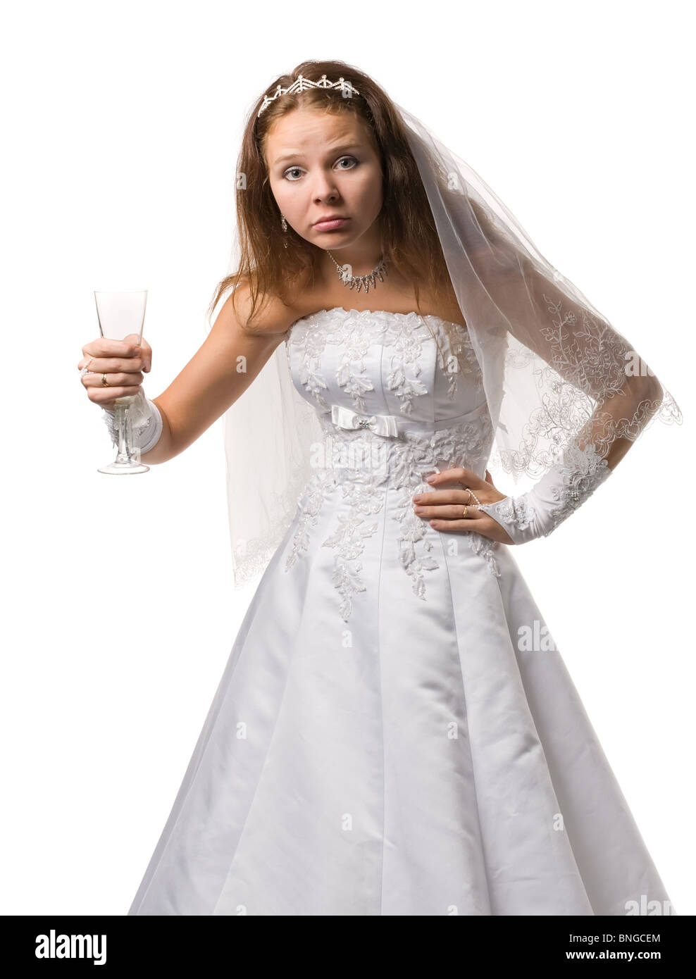 Drunk bride in a wedding dress stand akimbo, isolated on white Stock ...