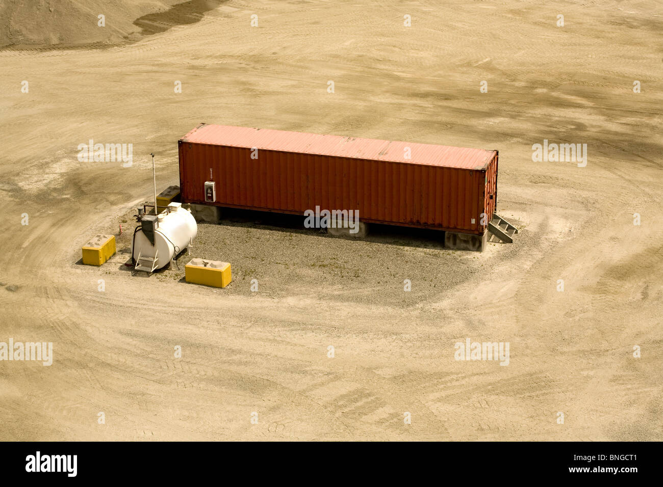 red container in center of cement making factory Stock Photo - Alamy