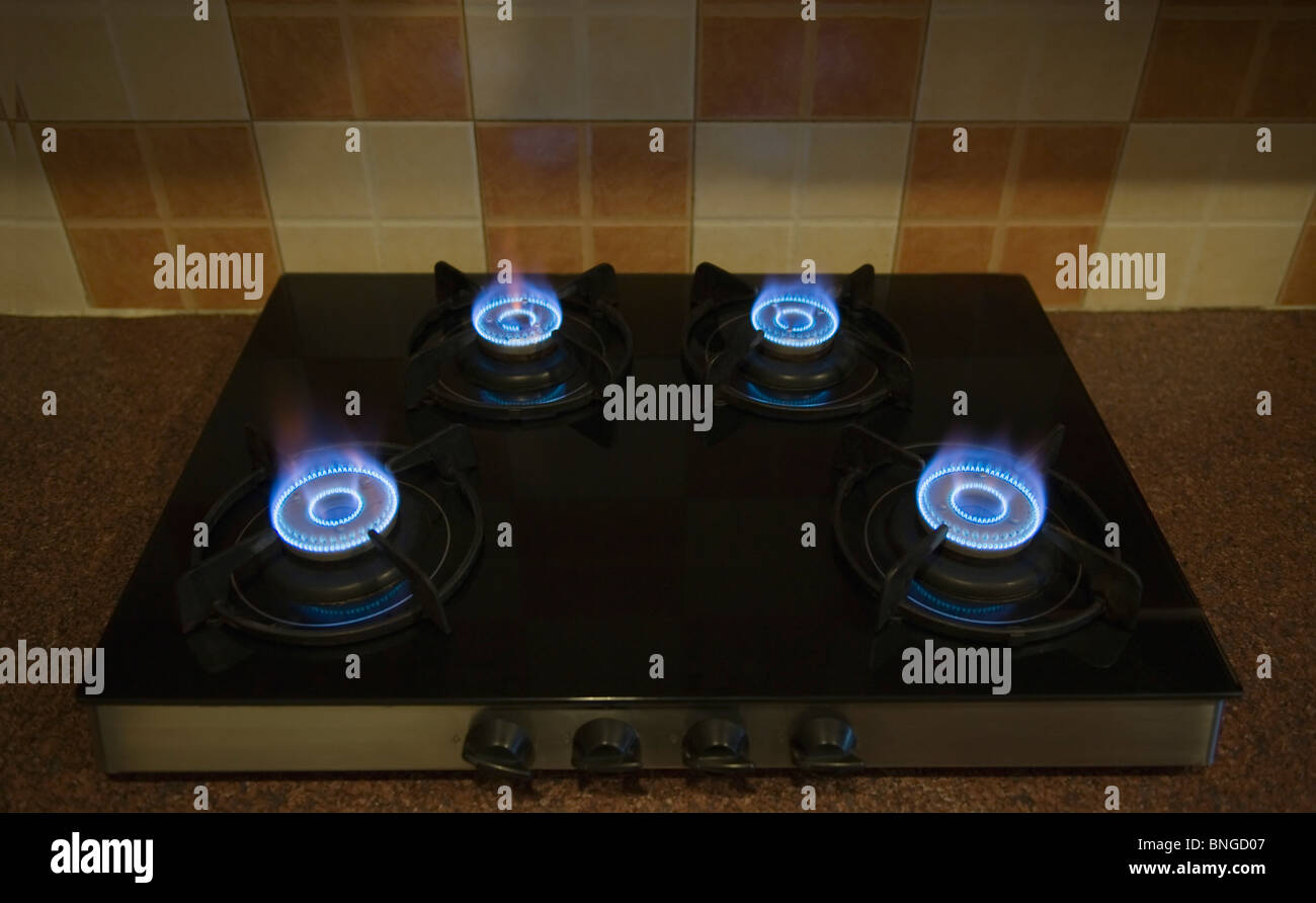 Gas stove on a kitchen counter Stock Photo - Alamy