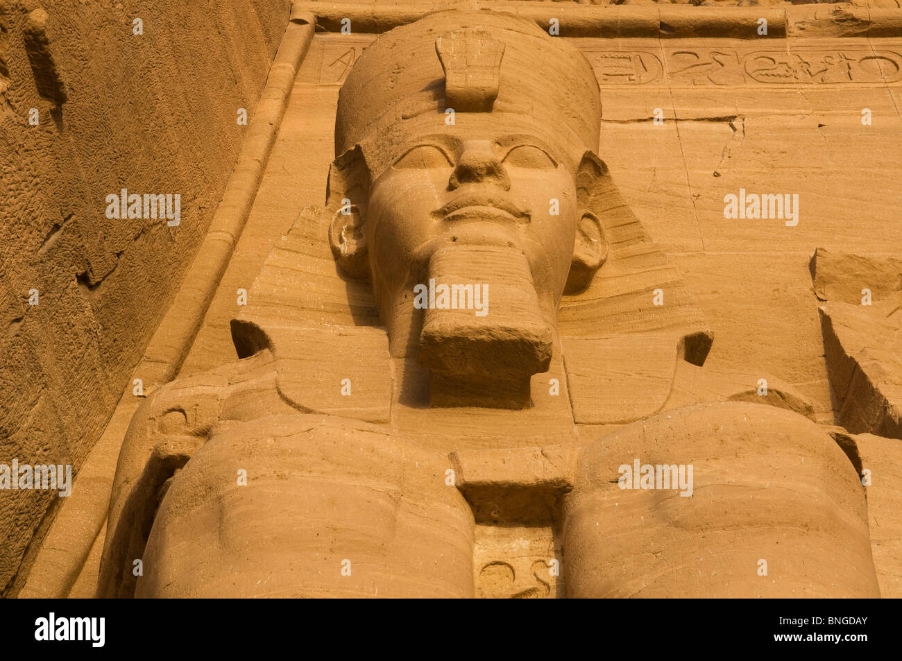 closeup of the pharaoh Ramses at the sun temple of Abu Simbel lit up in ...