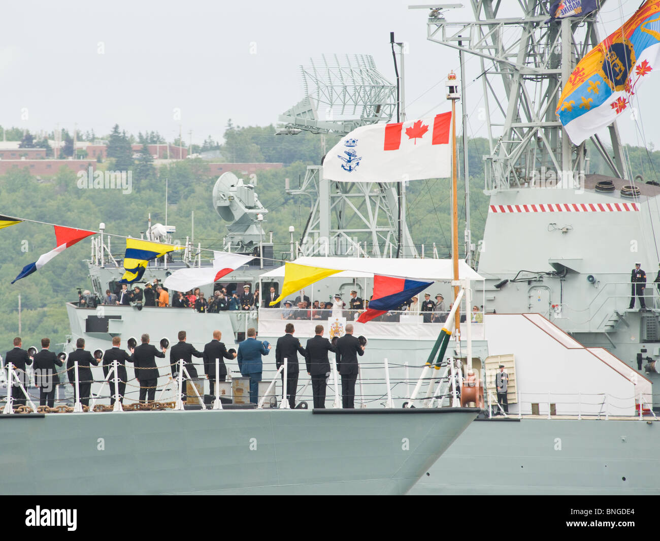 The crew of HMCS FREDERICTON salute the Queen on HMCS ST. JOHN'S during ...
