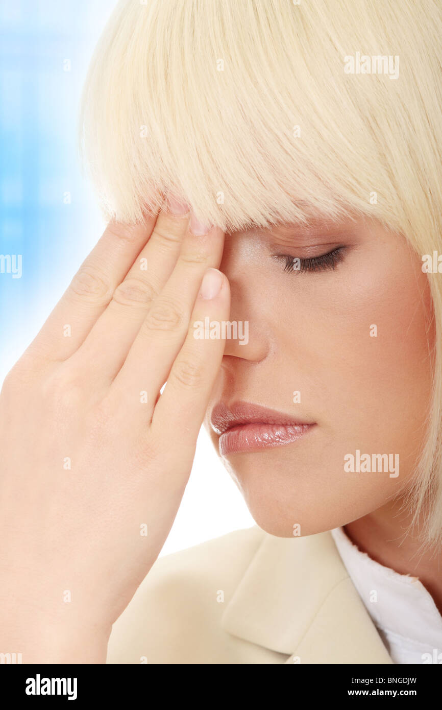 Young business woman with headache,Over abstract blue background Stock ...
