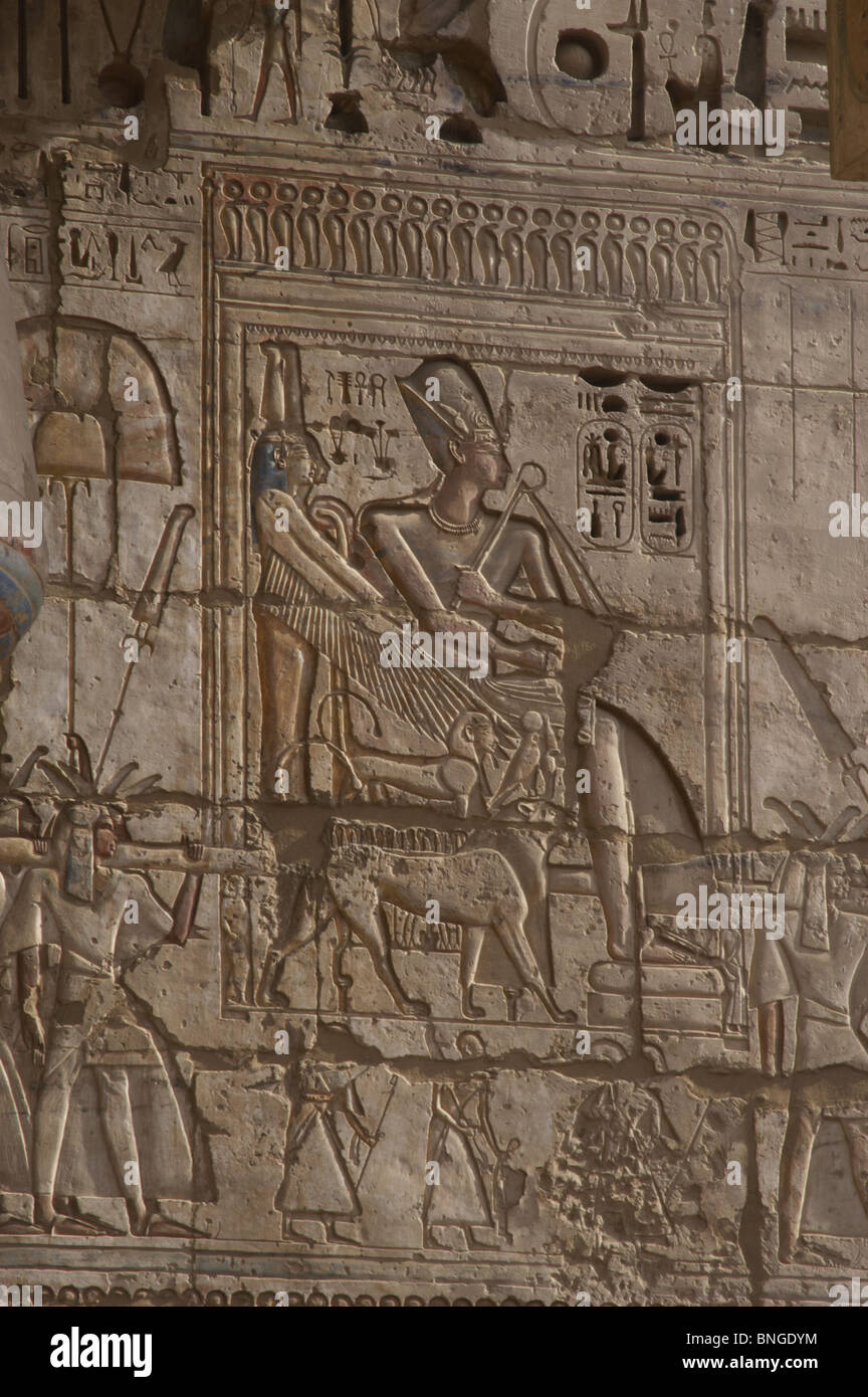 Temple of Ramses III. Ramses III wearing Khepresh being carried in ...