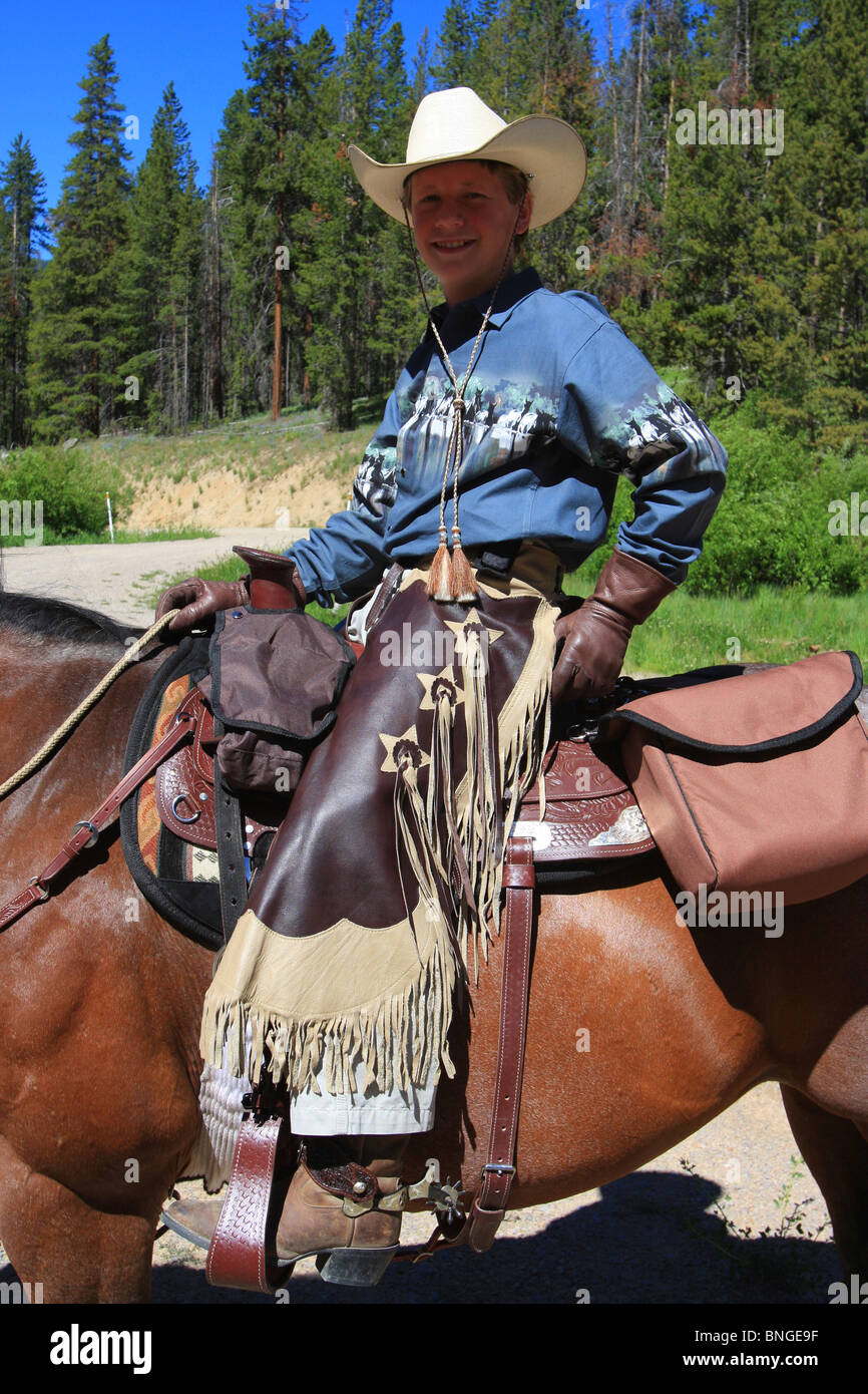 Cowboy riding a horse Stock Photo - Alamy