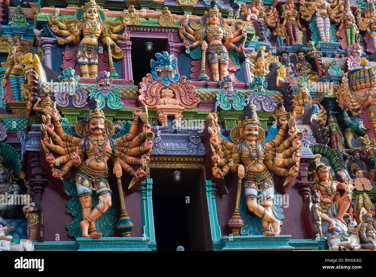 Stucco figures of deities on a temple, Meenakshi Amman Temple, Madurai ...