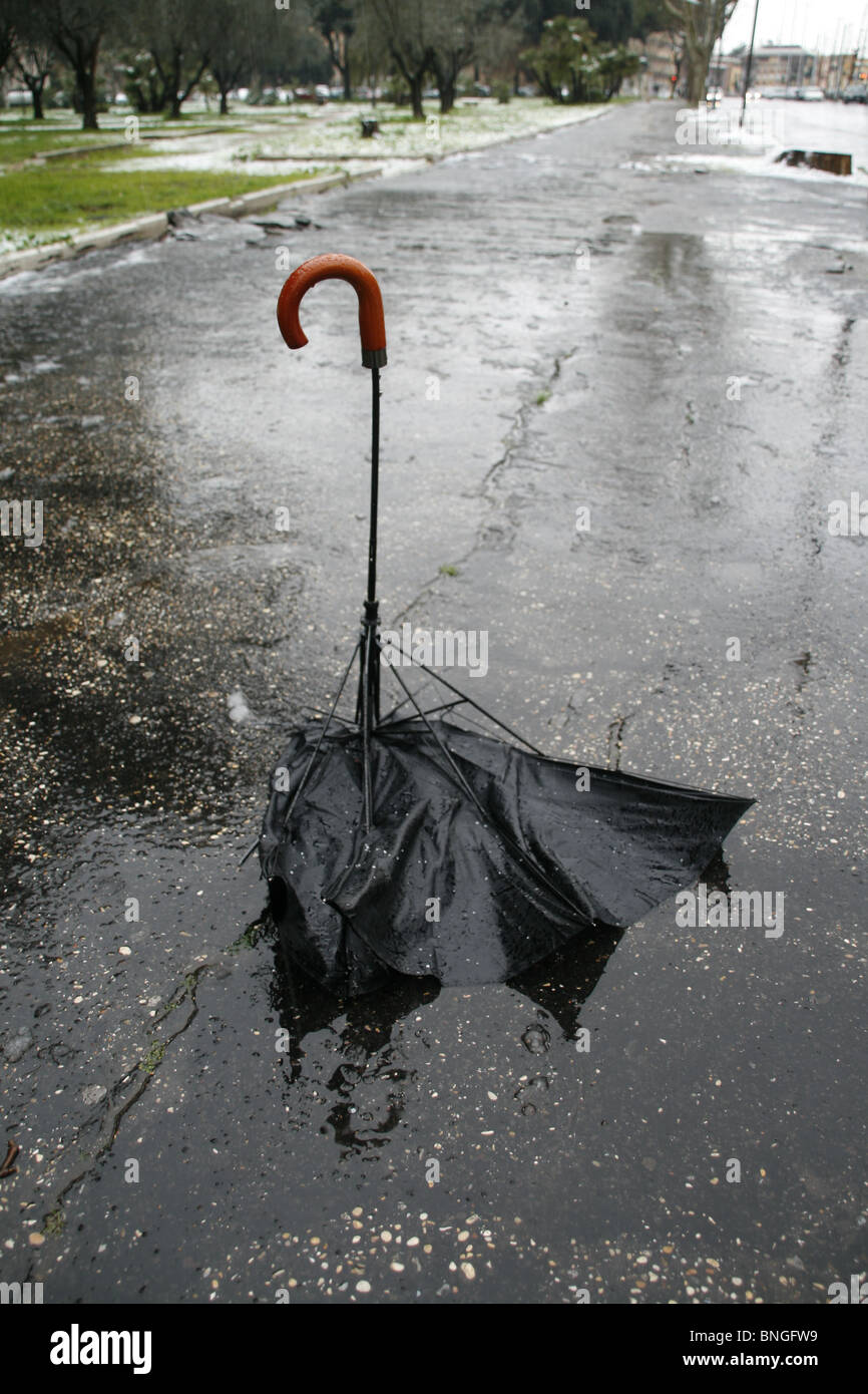 Broken umbrella on ground hi-res stock photography and images - Alamy