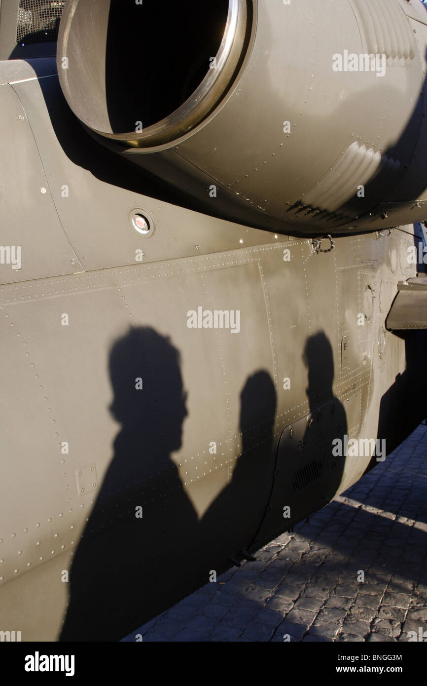 shadow of people on air force army helicopter at military open day ...