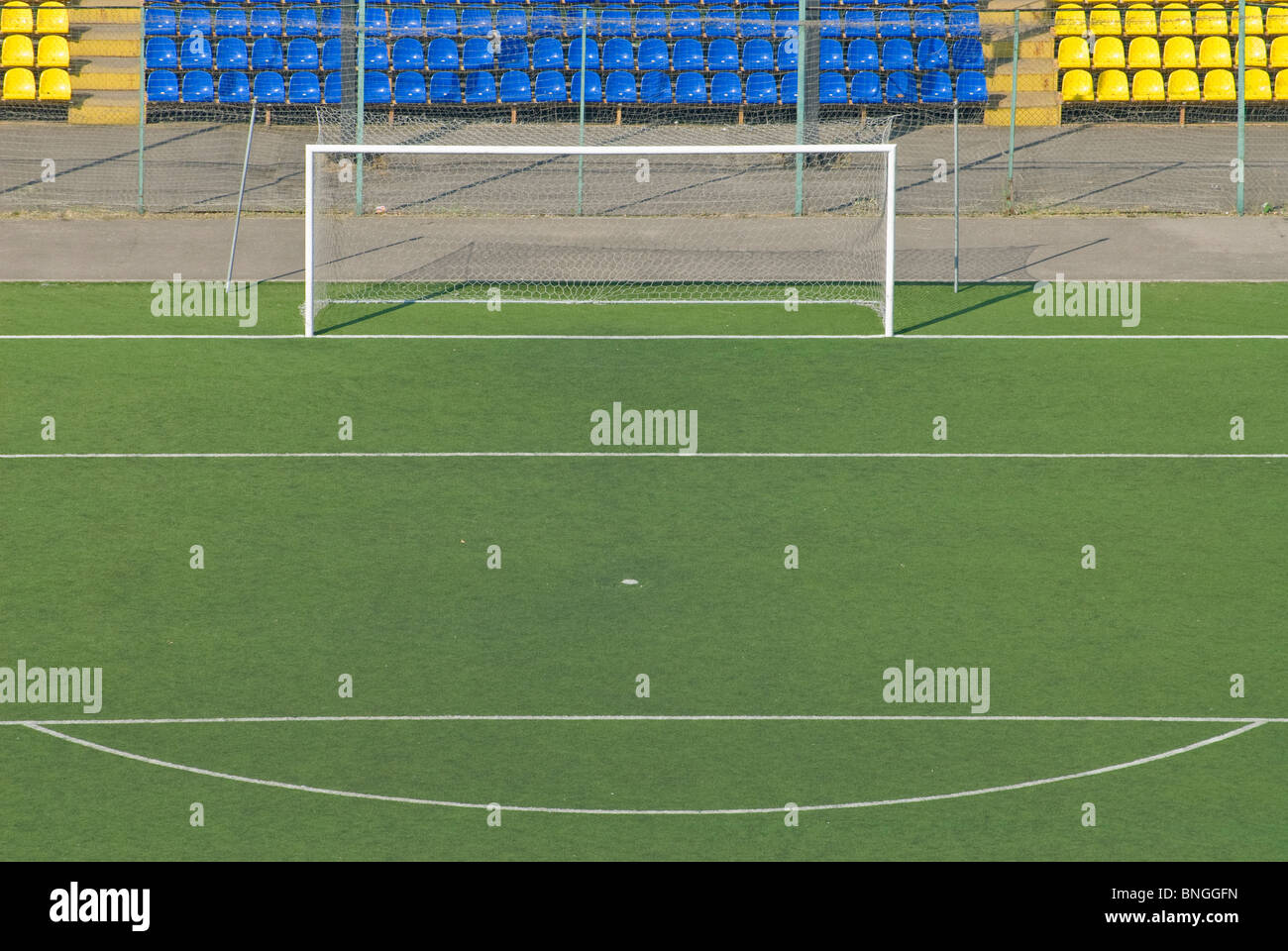 Empty football field Stock Photo - Alamy
