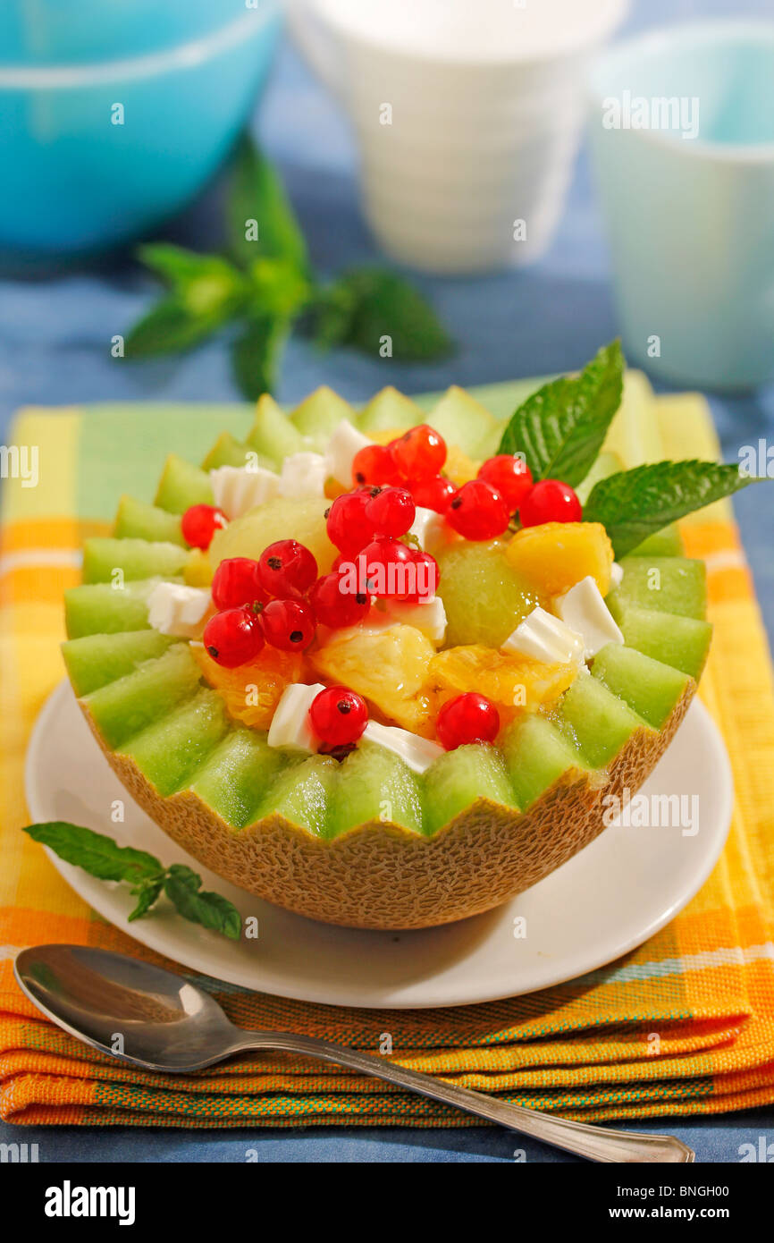 Melon with fruit and cheese. Recipe available Stock Photo - Alamy