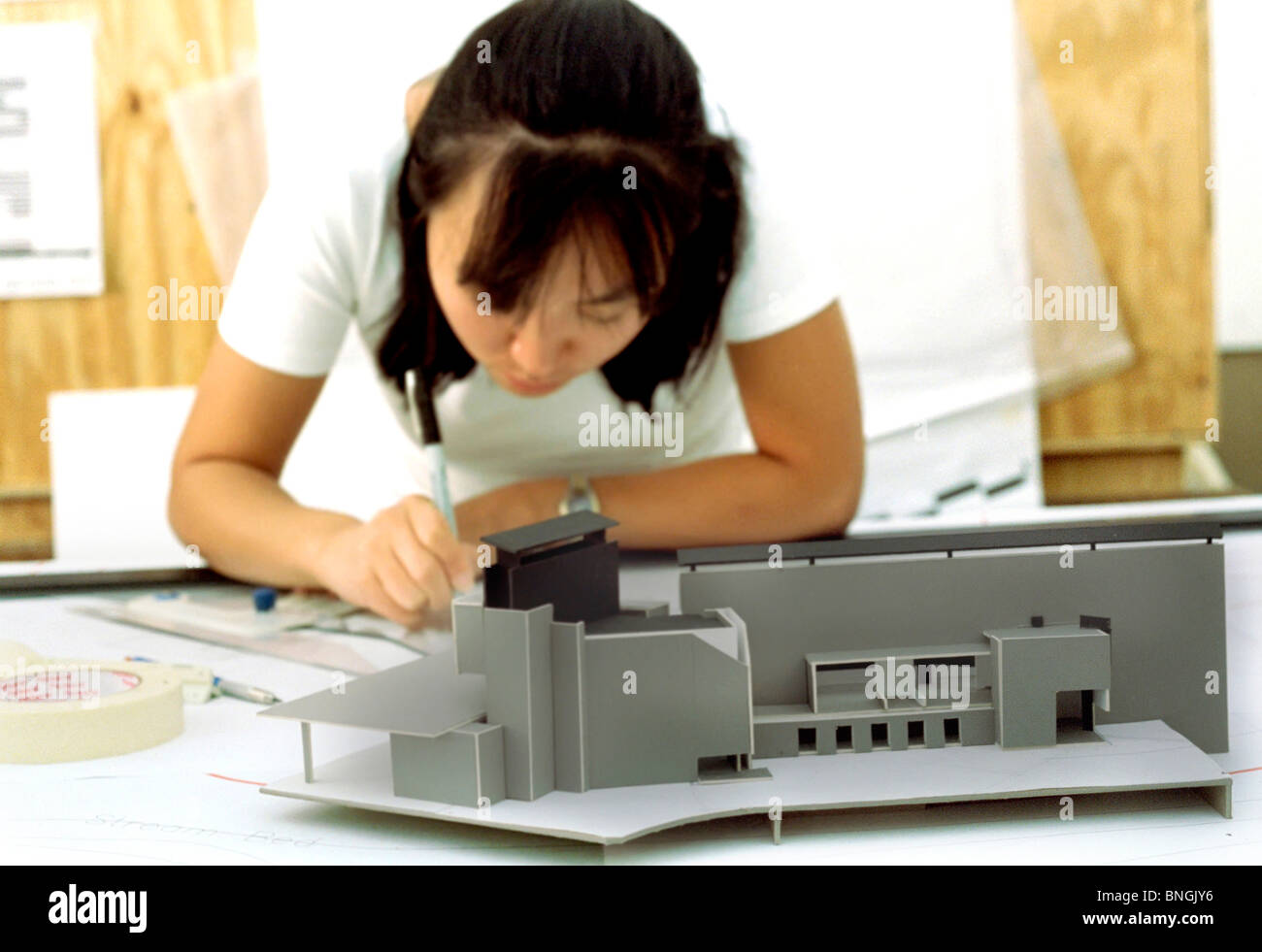 College architecture student working on a building model Stock Photo ...