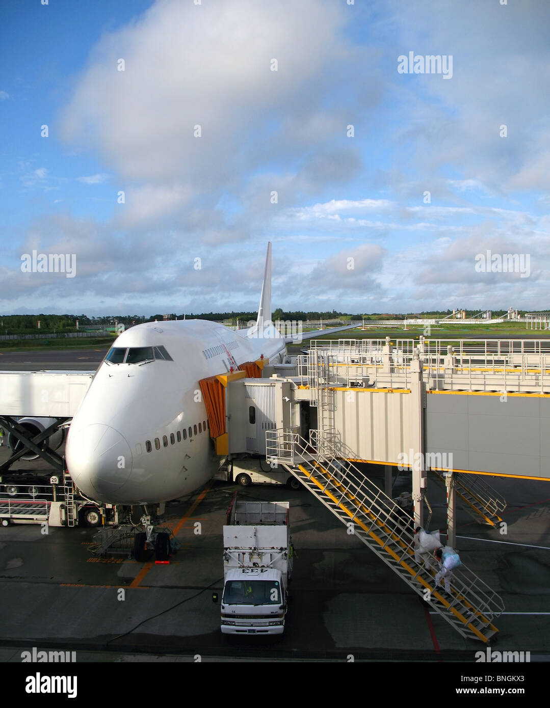 An aircraft is being prepared for take off at an airport Stock Photo ...