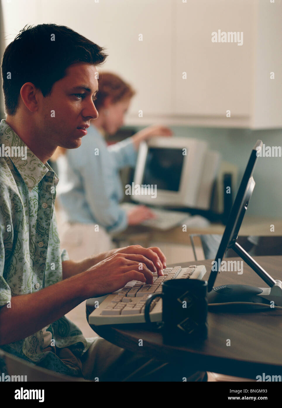 Young women students using computer lab hi-res stock photography and ...