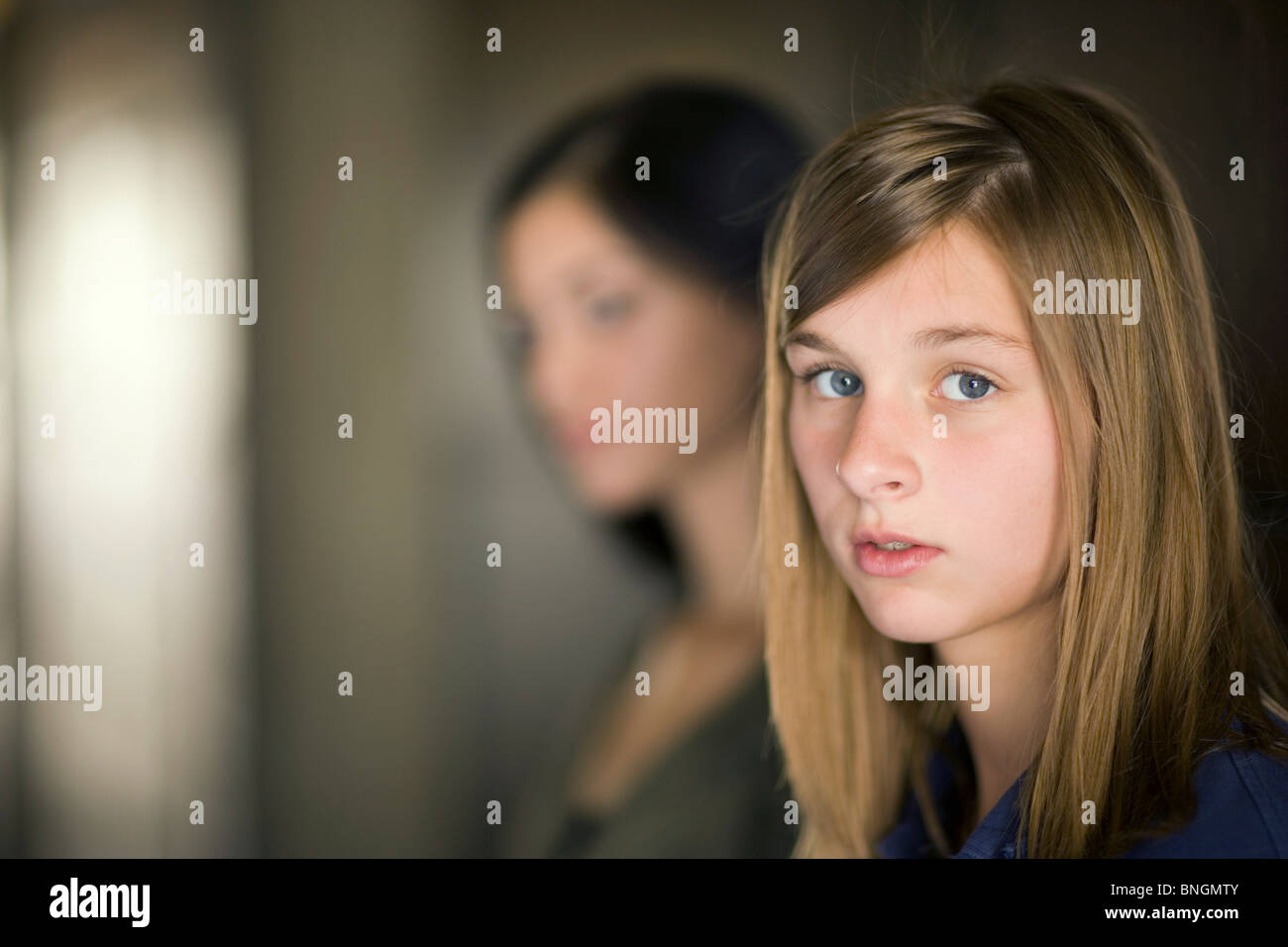 Portrait of a teenage girl looking serious Stock Photo - Alamy