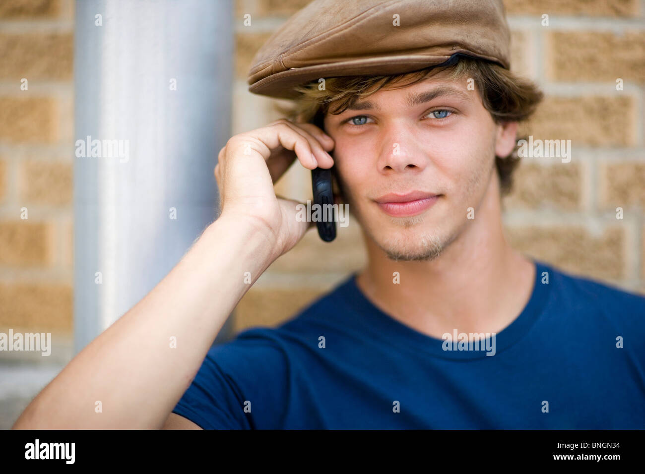Young man talking on a mobile phone, California, USA Stock Photo - Alamy