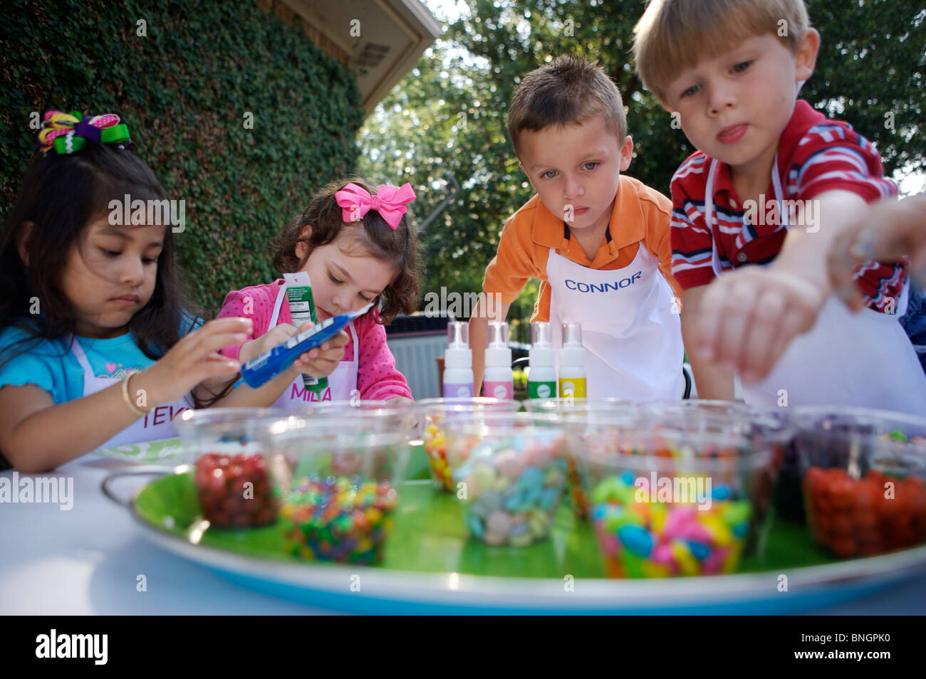 Kids having fun at party Stock Photo - Alamy