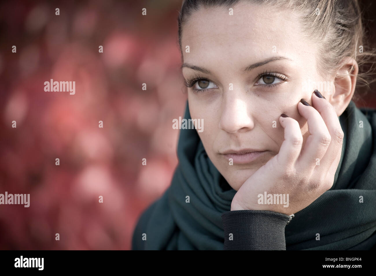 Sad girl in red scarf hi-res stock photography and images - Alamy