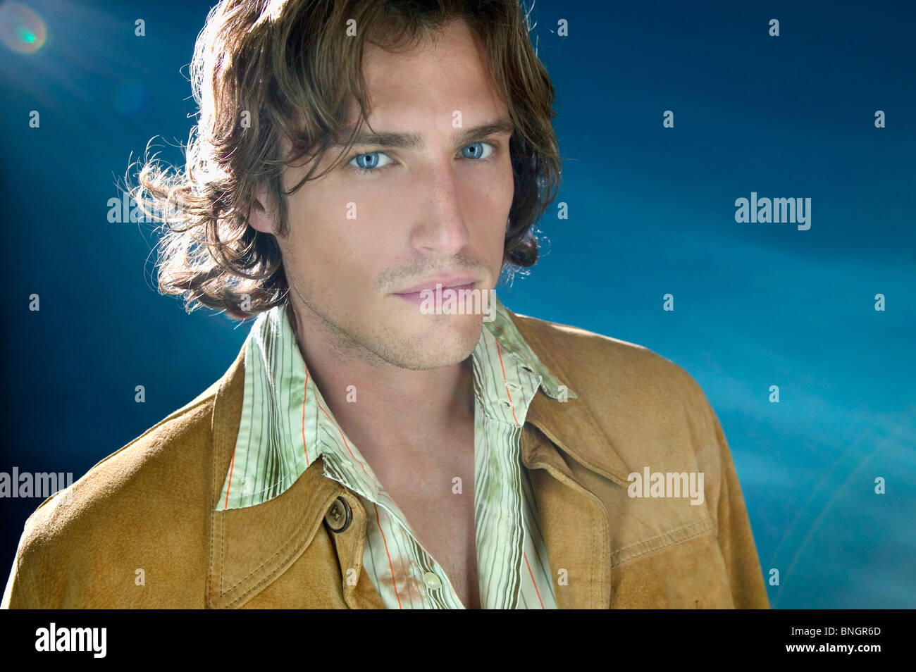 Young man wearing blue jacket hi-res stock photography and images - Alamy