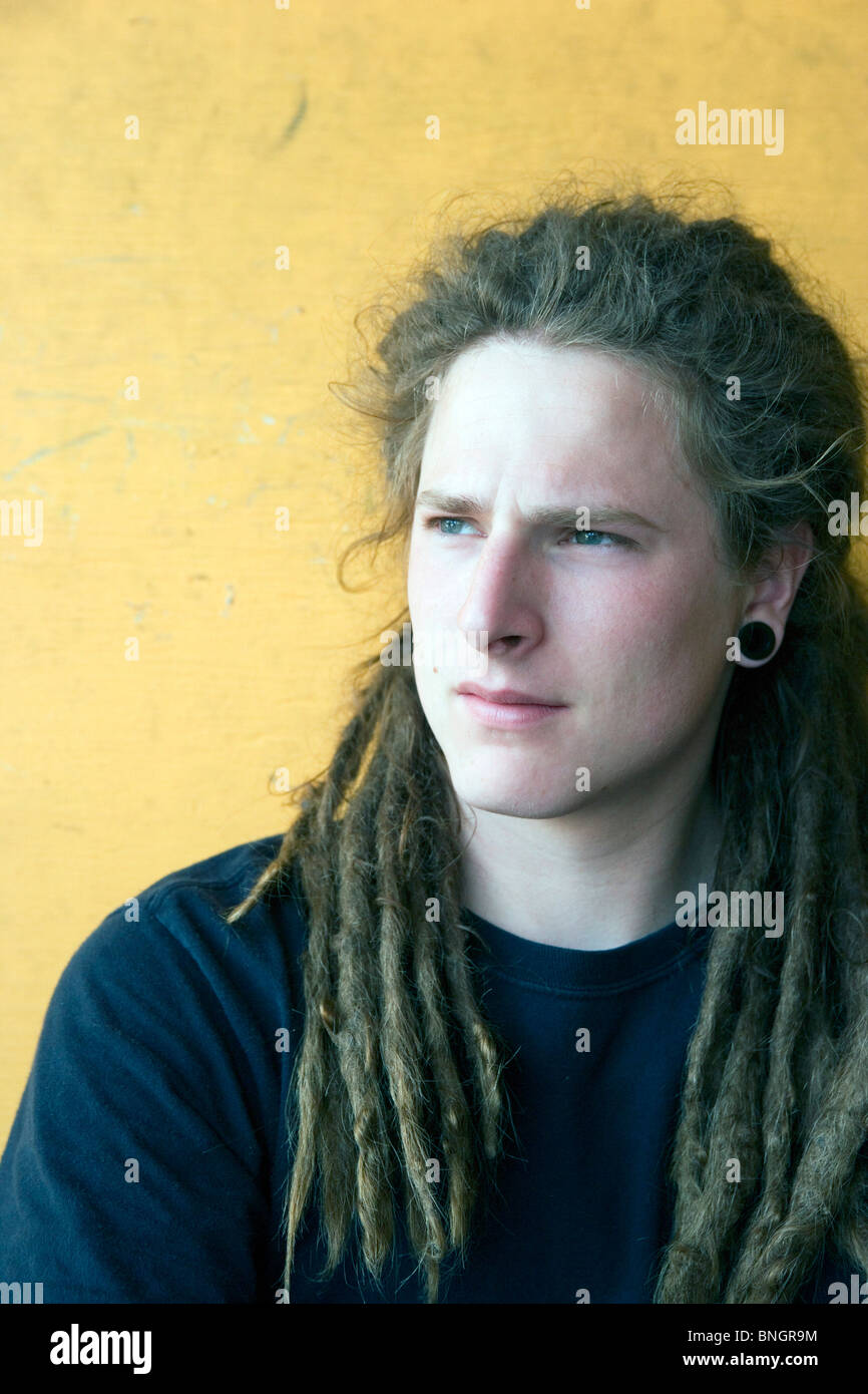 Young man with dreadlocks Stock Photo - Alamy
