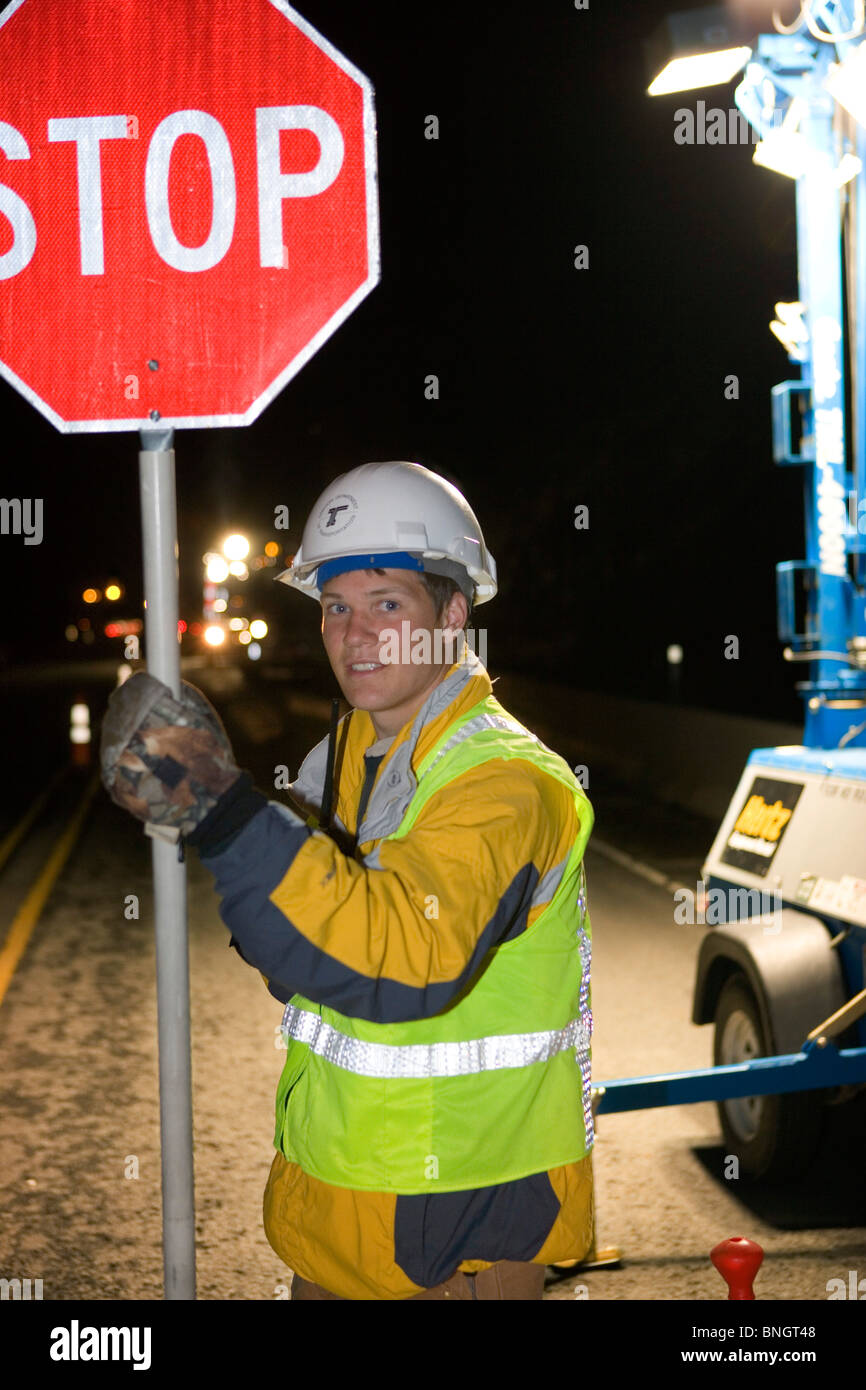 Portrait of street worker monitoring traffic Stock Photo - Alamy