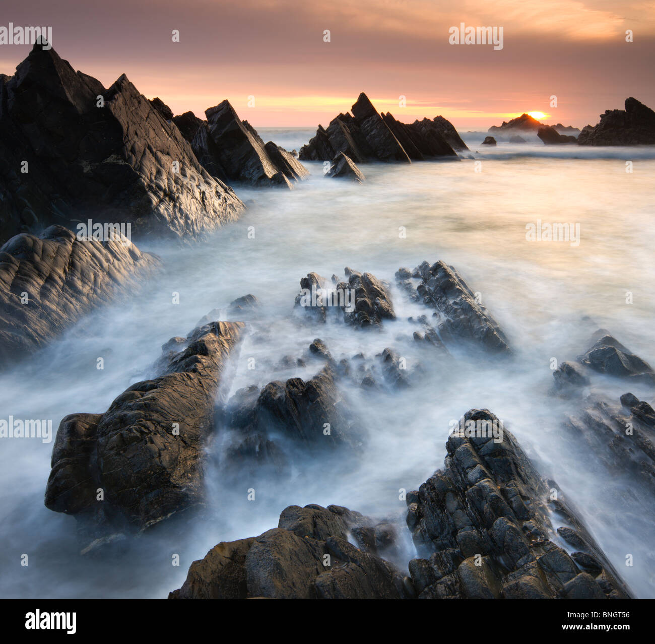 Dramatic coastal scenery at sunset, Hartland Quay, North Devon, England ...