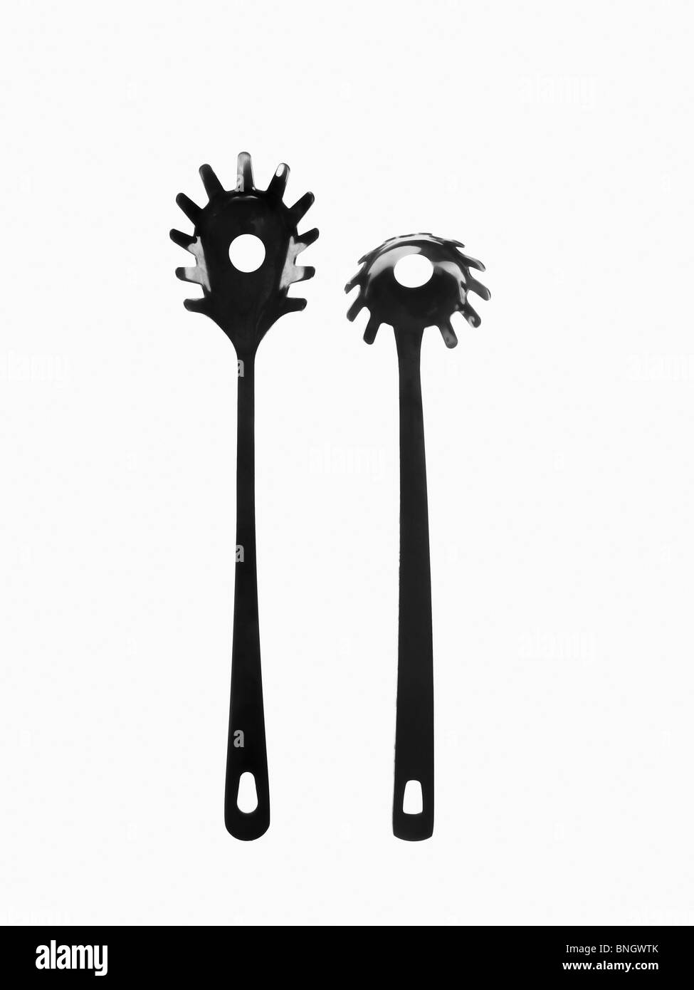 Black plastic spaghetti serving spoon Black and White Stock Photos & Images - Alamy