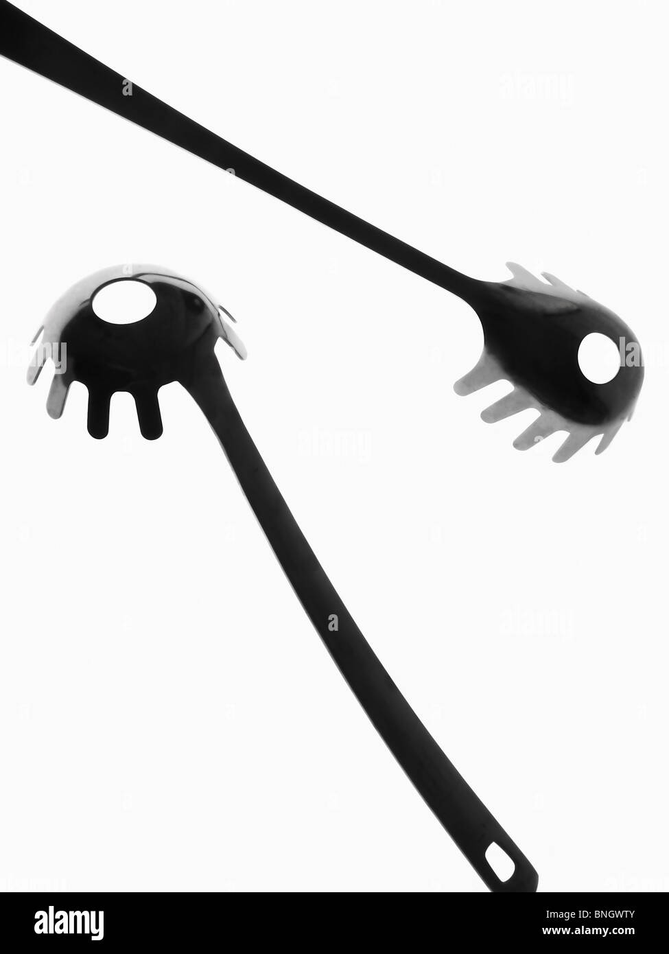 Black plastic kitchen spoon vertical hi-res stock photography and images - Alamy