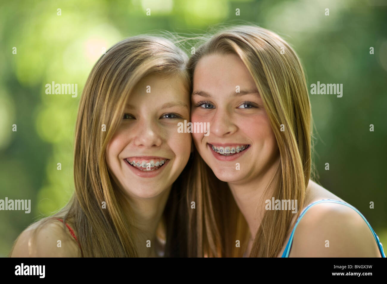 Portrait of two teenage girls smiling Stock Photo - Alamy Portrait of two teenage girls smiling Stock Photo - Alamy