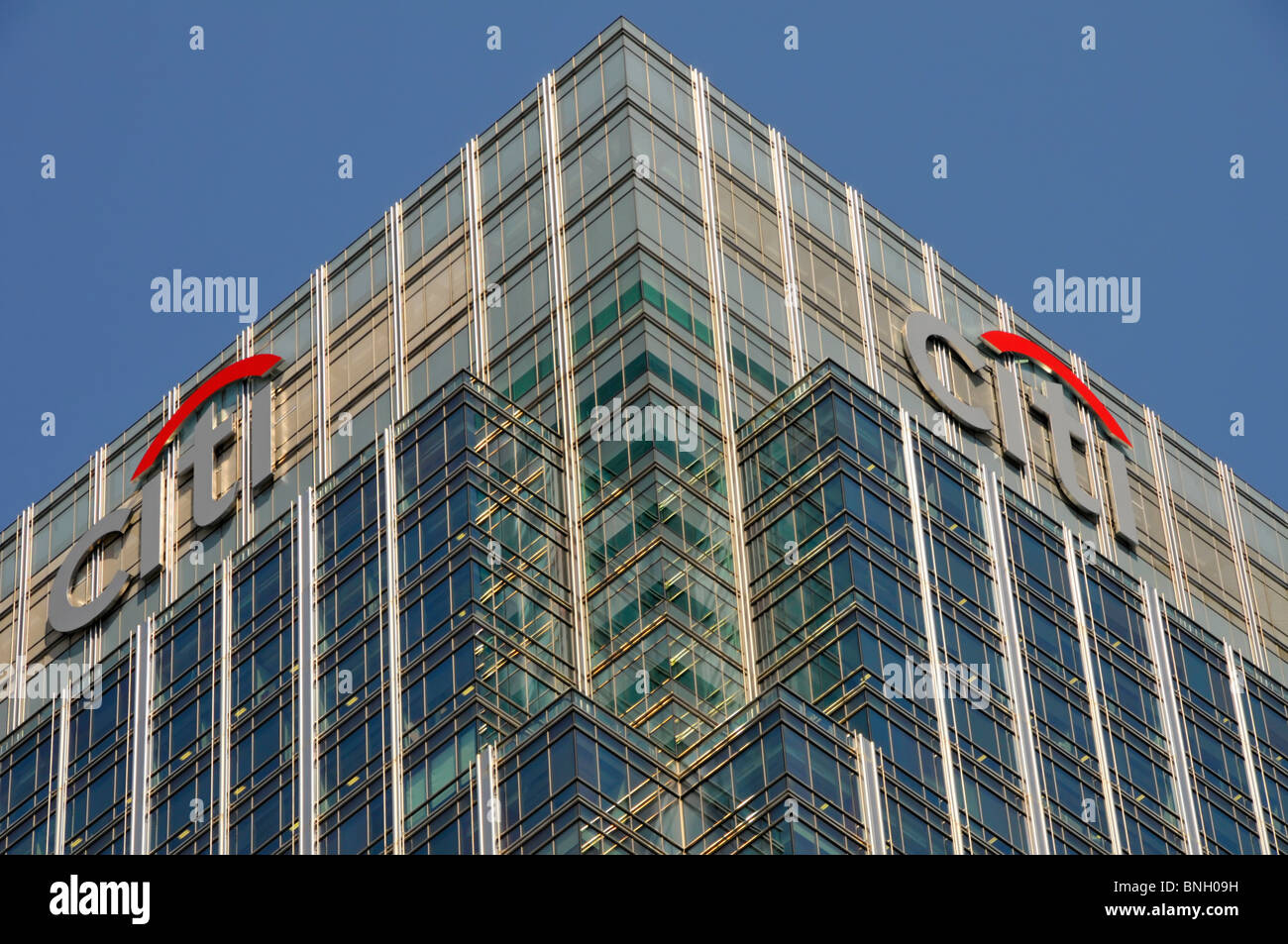 Roof level signs on Citi bank tower block in Canary Wharf Stock Photo ...