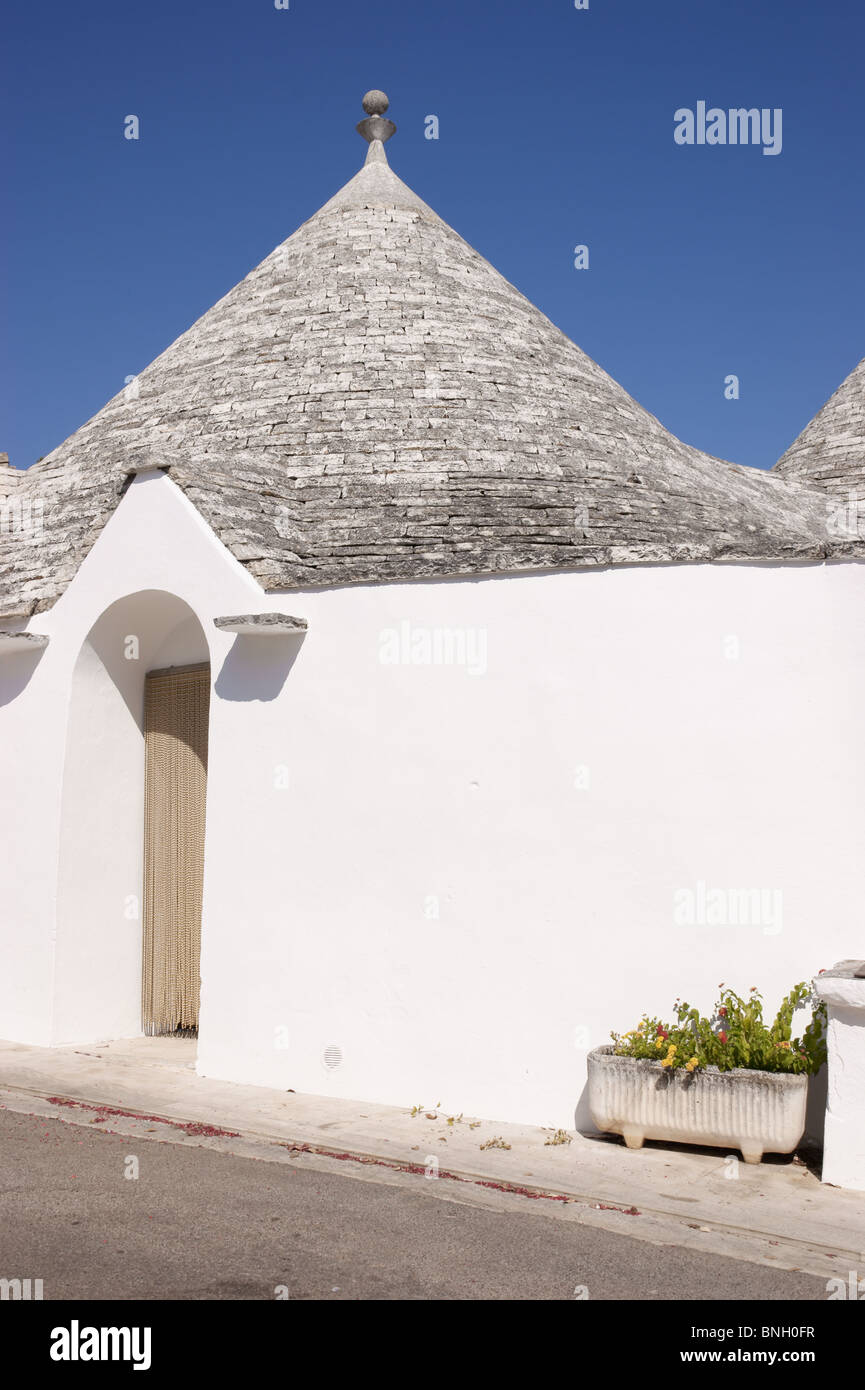 Exterior of a traditional trulli house in Alberobello (Puglia, Italy ...