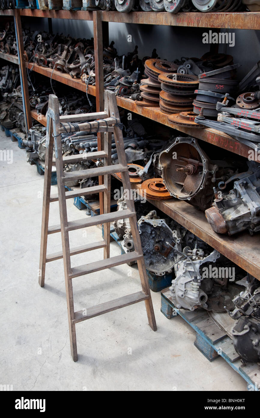 Wooden ladder and car parts Stock Photo - Alamy
