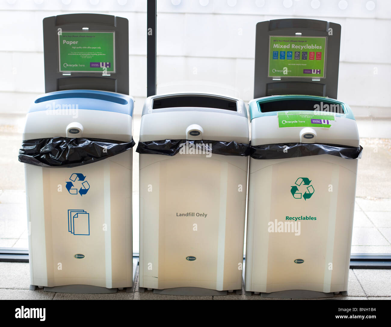 Three recycling bins Stock Photo - Alamy